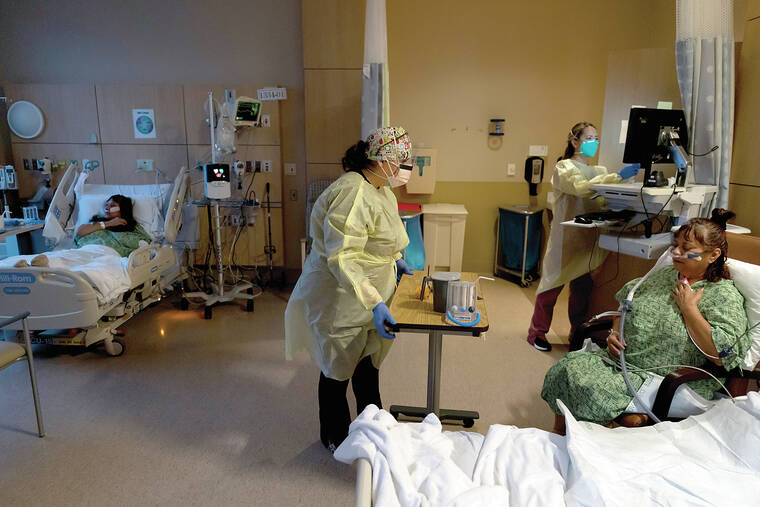 Health officials let COVID-infected staff stay on the job - Hawaii ...